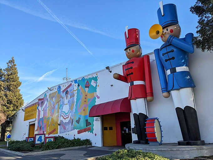 Those towering toy soldiers standing guard aren't just decoration; they're your first clue that childhood magic lives here.