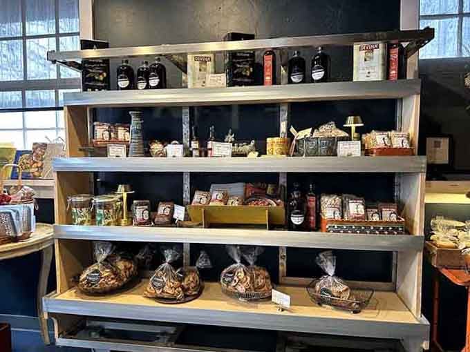 The dry goods shelf is stocked like someone's very sophisticated and delicious pantry dreams.