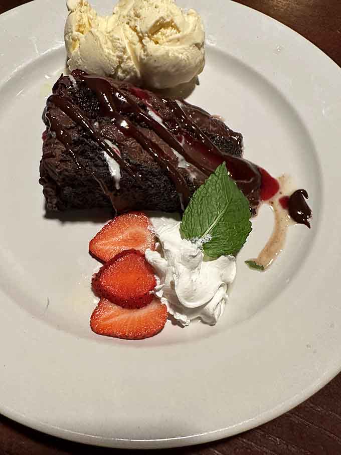 Chocolate brownie with ice cream and strawberries &ndash; the dessert equivalent of a warm hug from your favorite aunt.