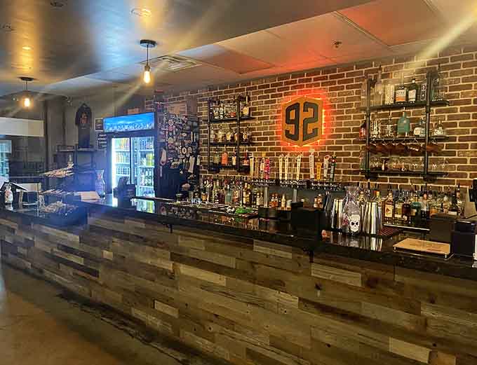 That well-stocked bar backed by brick and the iconic 92 logo proves grown-up game night just got infinitely better.