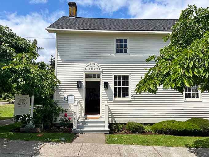 Mill Creek Market's charming white exterior promises delightful discoveries inside, like a present you get to unwrap yourself.