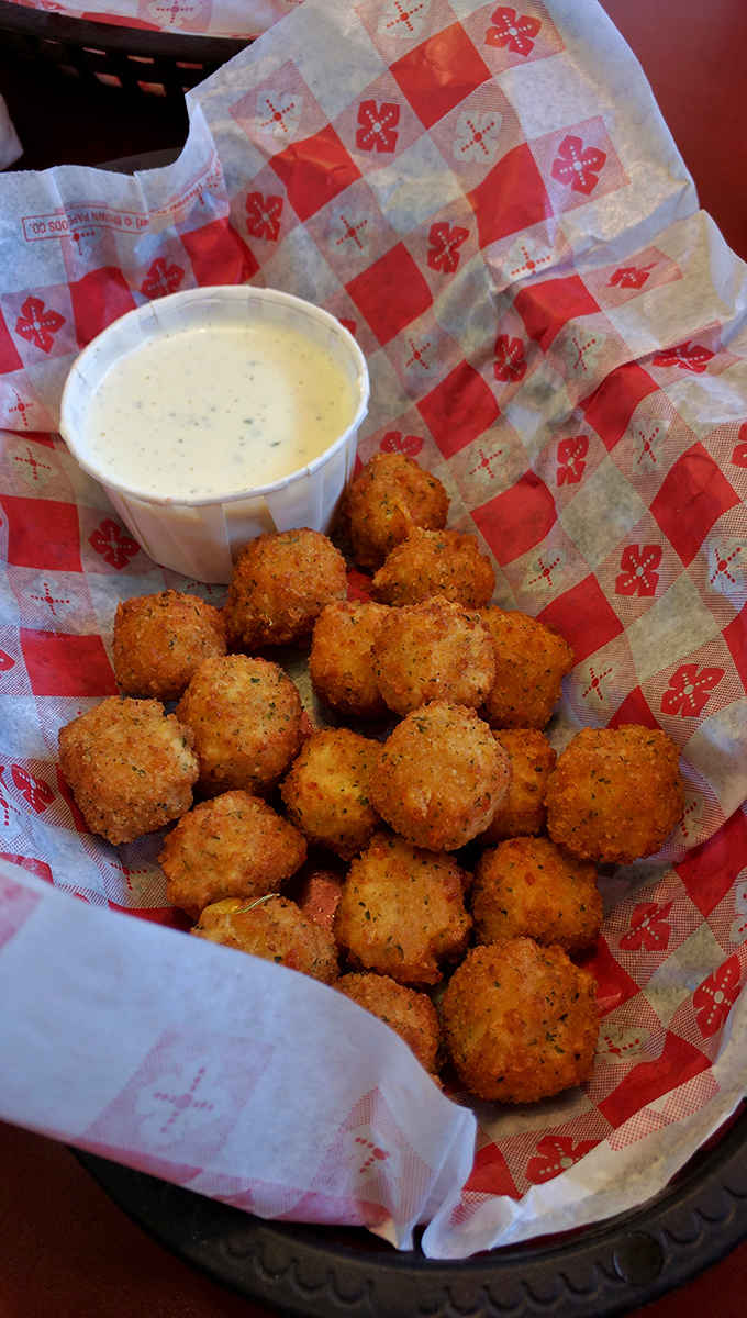 These golden cheese balls with ranch dressing are basically edible happiness, fried to crispy perfection and ready for dipping.