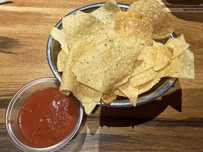 Fresh tortilla chips stacked high next to vibrant salsa represent the opening act that often steals the whole show.