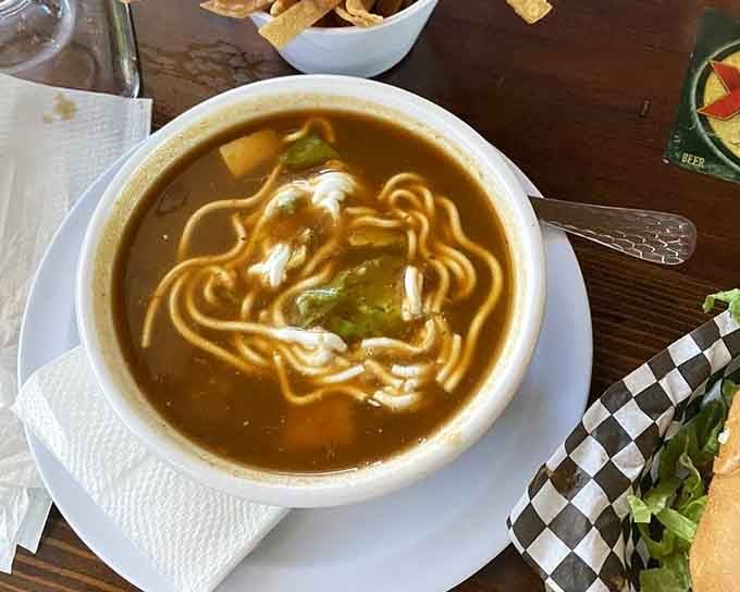 Sopa de tortilla arrives steaming hot, ready to warm your soul one spoonful at a time.