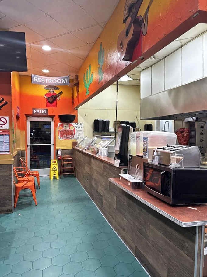 Colorful murals and cheerful decor transform this space into somewhere you'd actually want to hang out and eat.