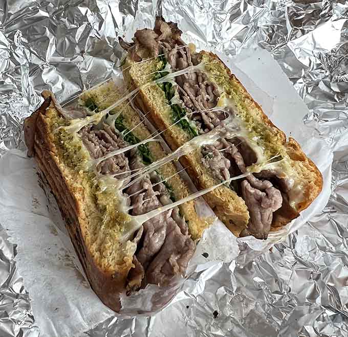 That roast beef melt with the cheese pull is what happens when a bagel shop masters both breakfast and lunch service.