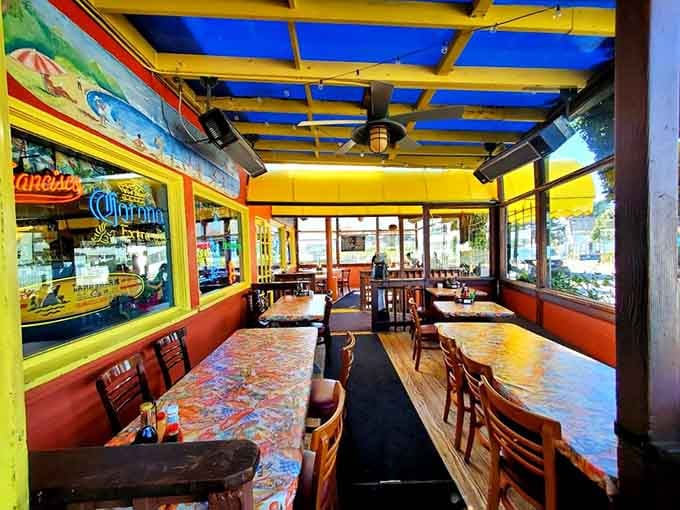Yellow picnic tables overlooking the Pacific Ocean create the ultimate California dining room with a view.
