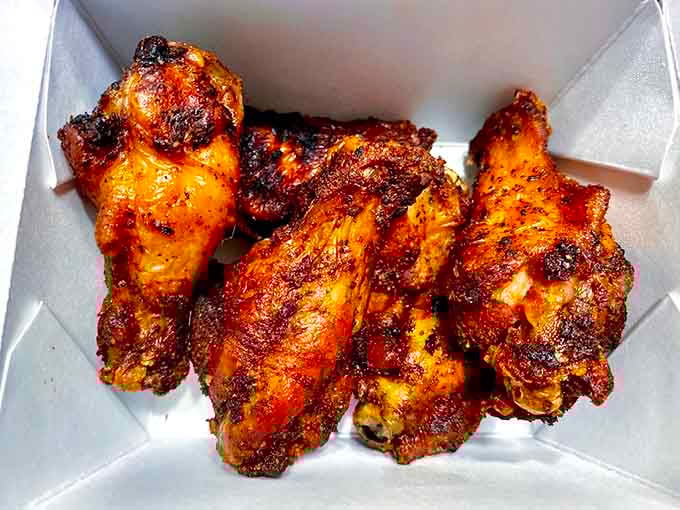Smoked wings with that caramelized glaze prove chicken doesn't always need to be fried to achieve perfection.