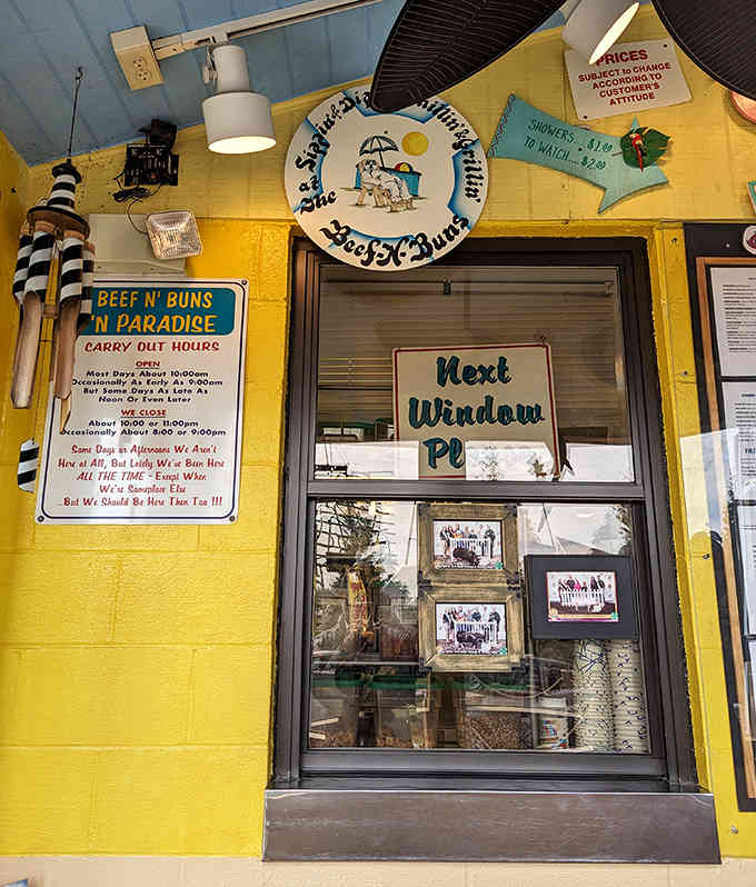 A "Next Window Please" sign surrounded by beach memorabilia keeps things organized while maintaining that laid-back island energy.
