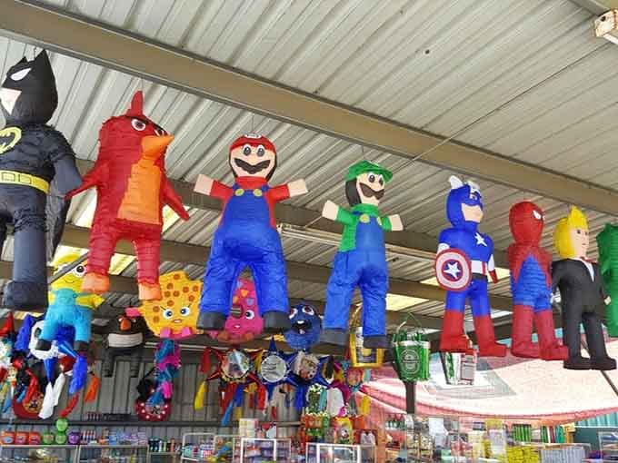 Superhero pi&ntilde;atas dangle overhead like the world's most festive Justice League, ready to make any party absolutely legendary.
