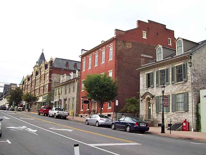 Main street architecture spans centuries, each facade competing for "most likely to appear on a postcard" honors.