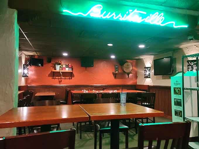 Neon signs and cozy booths create that perfect neighborhood vibe where everyone feels like a regular.