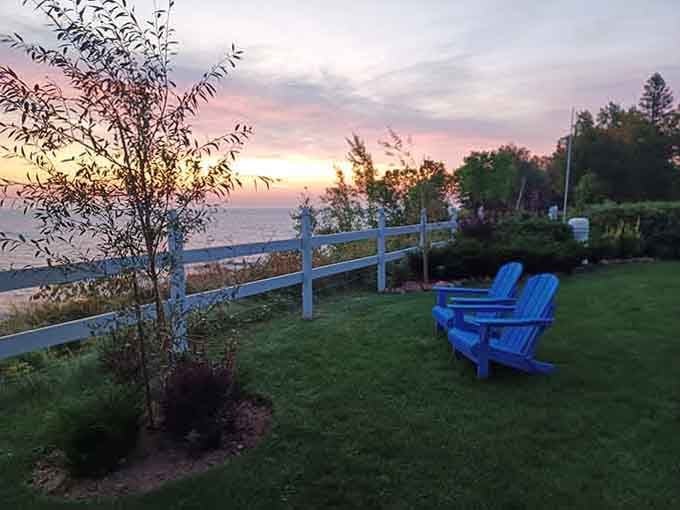 Those blue Adirondack chairs facing the sunset know exactly what they're doing, and they're not apologizing for it.