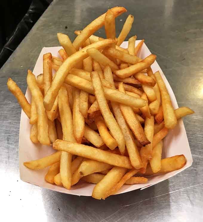 Golden fries piled high like a delicious haystack make the perfect vehicle for soaking up every drop of barbecue sauce.