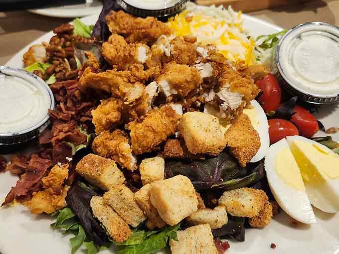 A salad loaded with fried shrimp, bacon, and eggs that makes eating vegetables feel like a reward.
