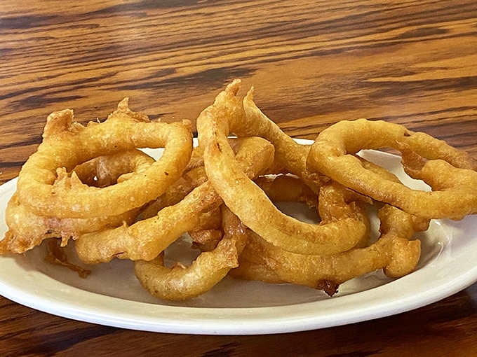 Perfectly golden onion rings that prove sometimes the simple things in life are actually the best things.