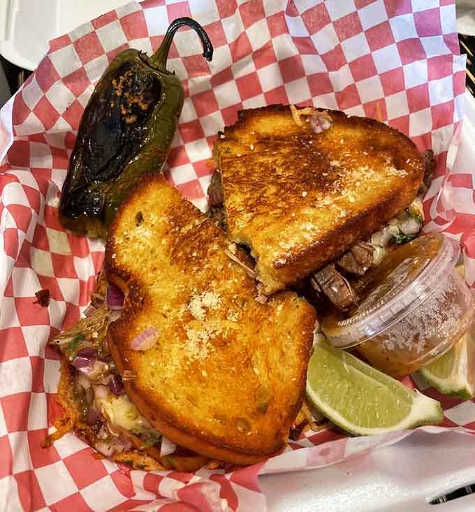 Garlic bread grilled cheese stuffed with birria, because sometimes you need carbs hugging your protein with buttery enthusiasm.