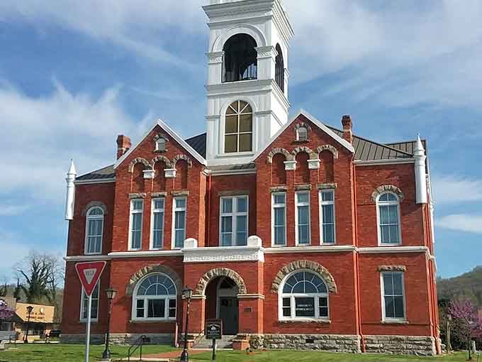 The Union County Courthouse's red brick and white trim combination proves government buildings can actually be photogenic when they try.