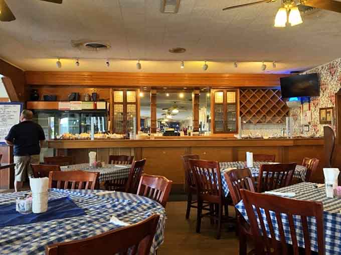 The warm wood tones and vintage stove display add character without trying too hard to be trendy or Instagram-worthy.