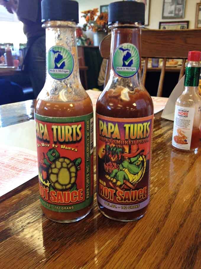 Papa Turts hot sauce bottles standing ready like flavorful sentries guarding your breakfast from blandness forever.