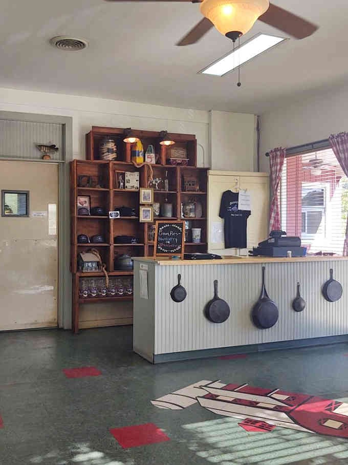 Cast iron skillets decorating the counter aren't just for show; they represent the serious cooking happening behind scenes.
