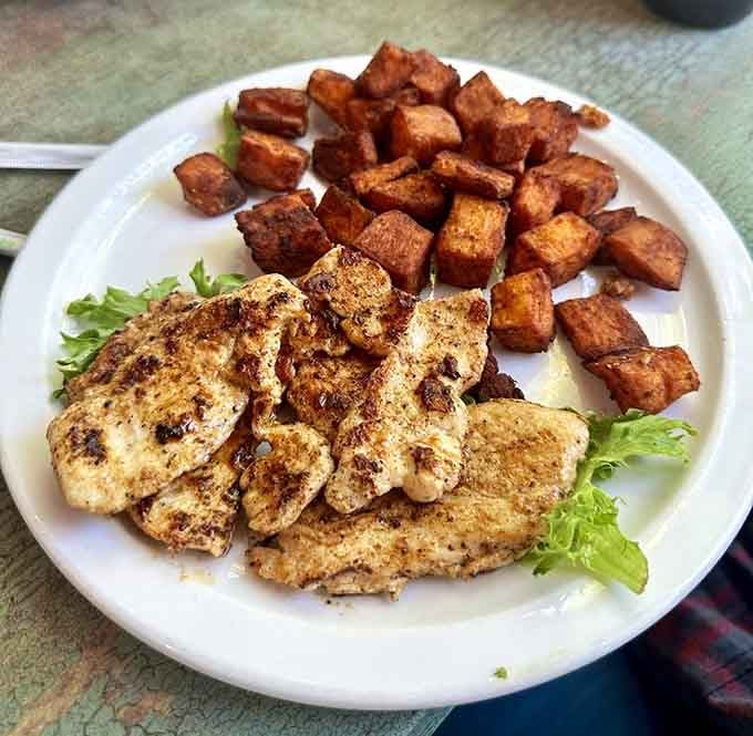 Perfectly seasoned grilled chicken with sweet potato cubes that could convert even the most devoted mashed potato loyalists.