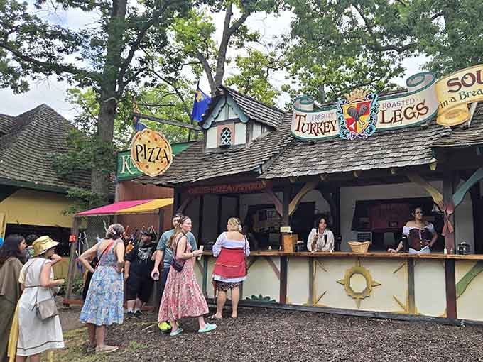 That turkey leg stand does brisk business serving Renaissance fast food that requires two hands and zero shame.