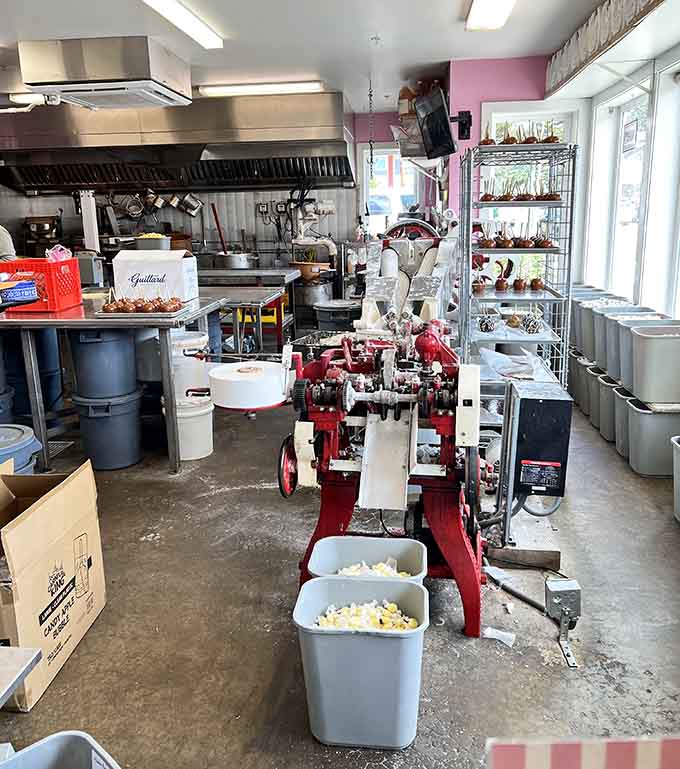 The candy-making machinery stands like industrial art, turning sugar into coastal magic since the sixties.