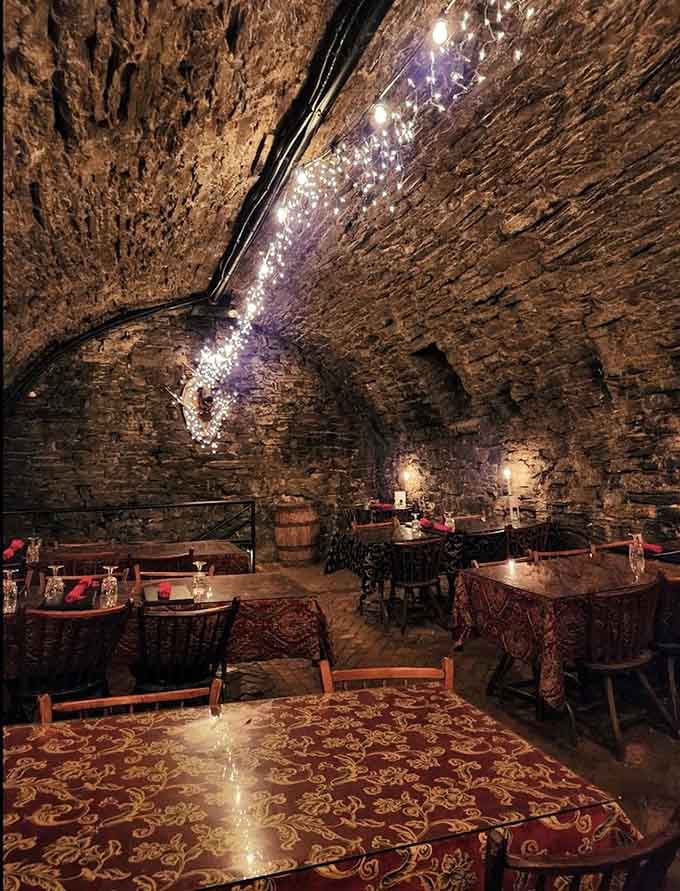 Stone arches and candlelit tables 43 feet underground make every dinner feel like a scene from Indiana Jones.