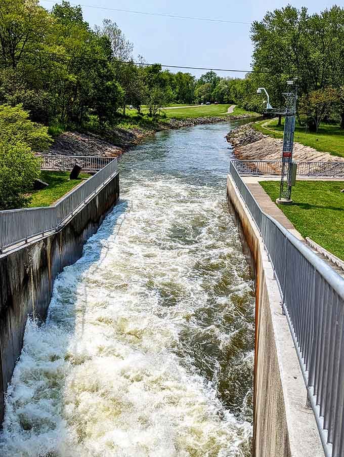 The spillway creates a rushing water show that's oddly mesmerizing, like nature's own white noise machine.