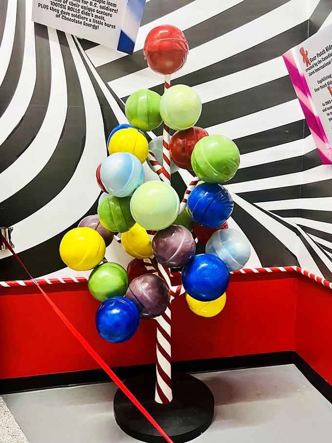 This lollipop tree sculpture is pure Willy Wonka energy, minus the questionable child safety record.