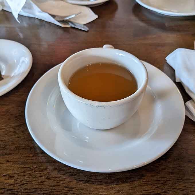 A simple cup of tea served in proper china, proving that even the basics get respect at this place.