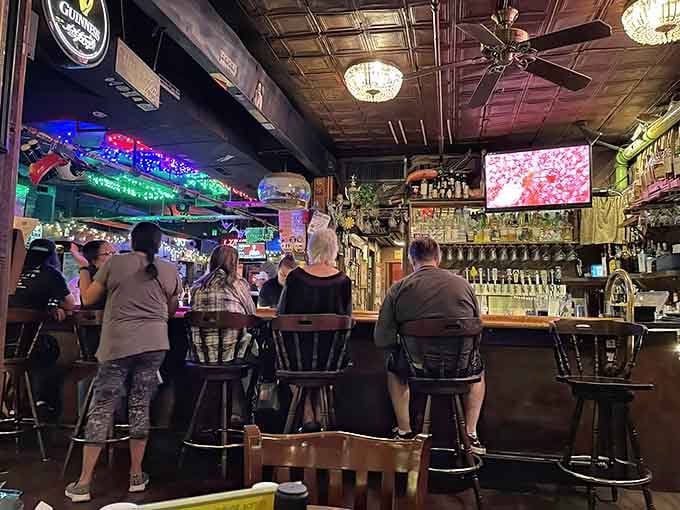 That vintage tin ceiling and eclectic decor remind you of your favorite uncle's rec room, but classier.