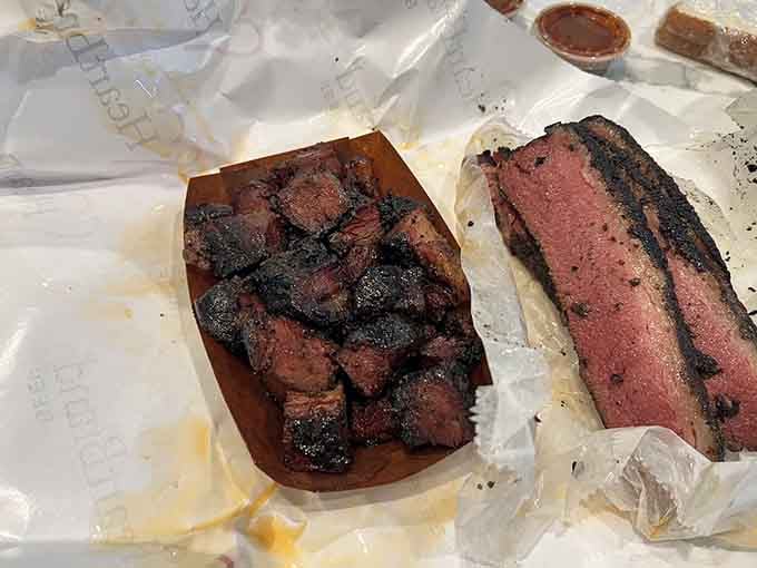 Burnt ends and pastrami side by side, like the dynamic duo of the barbecue world ready to save your lunch.