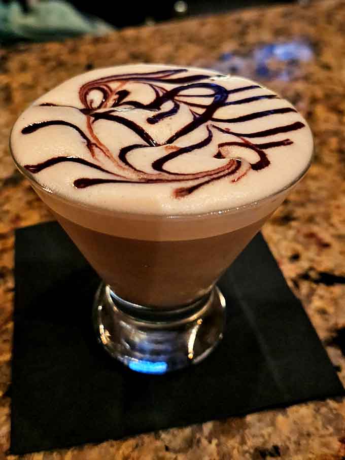Artistic foam swirls transform this espresso martini into drinkable art that's almost too pretty to sip, almost being key.