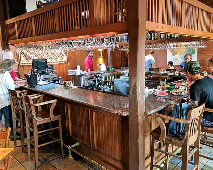 The bar area where you can grab a drink and watch the magic happen in real time.