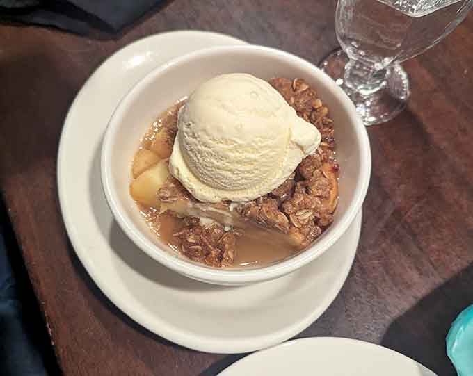 Apple crumble topped with vanilla ice cream&mdash;the warm, comforting finale your seafood feast deserves after all that deliciousness.