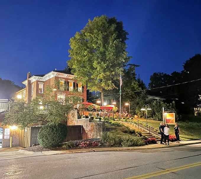 Evening lights transform this riverside spot into the kind of scene that makes dinner reservations feel important.