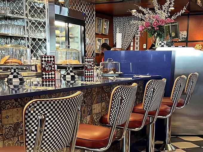 Counter seating with checkered stools where you can watch the magic happen while sipping your third cup of coffee.