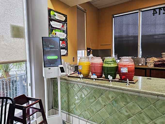 Those colorful agua fresca dispensers are like a rainbow of refreshment waiting to happen.