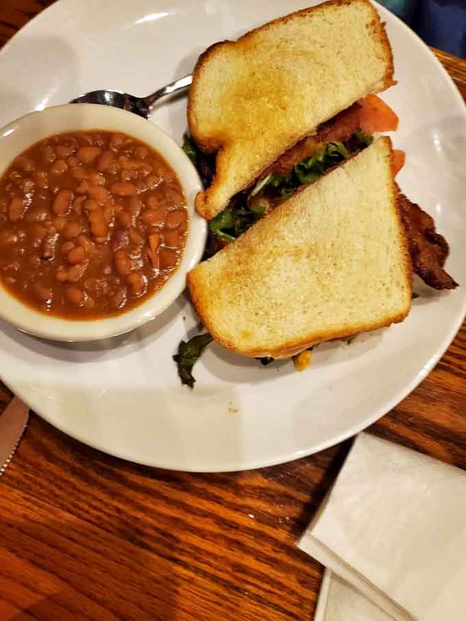 The Pimento Cheese BLT with baked beans on the side is Southern comfort food that doesn't apologize for being delicious.