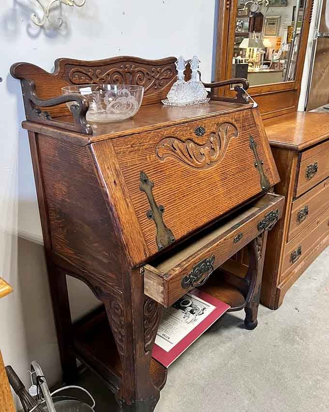 This secretary desk has seen more secrets than a therapist and looks infinitely more distinguished doing it.