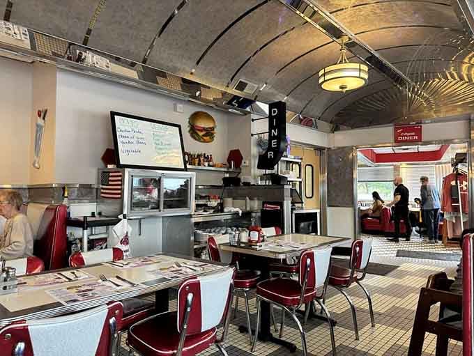 That curved ceiling and vintage lighting create ambiance that modern restaurants spend fortunes trying to replicate.