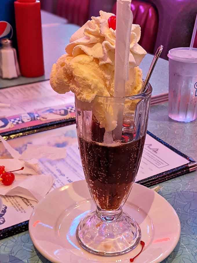 A root beer float defying gravity and good sense, piled high with vanilla ice cream in glorious, melting abundance.