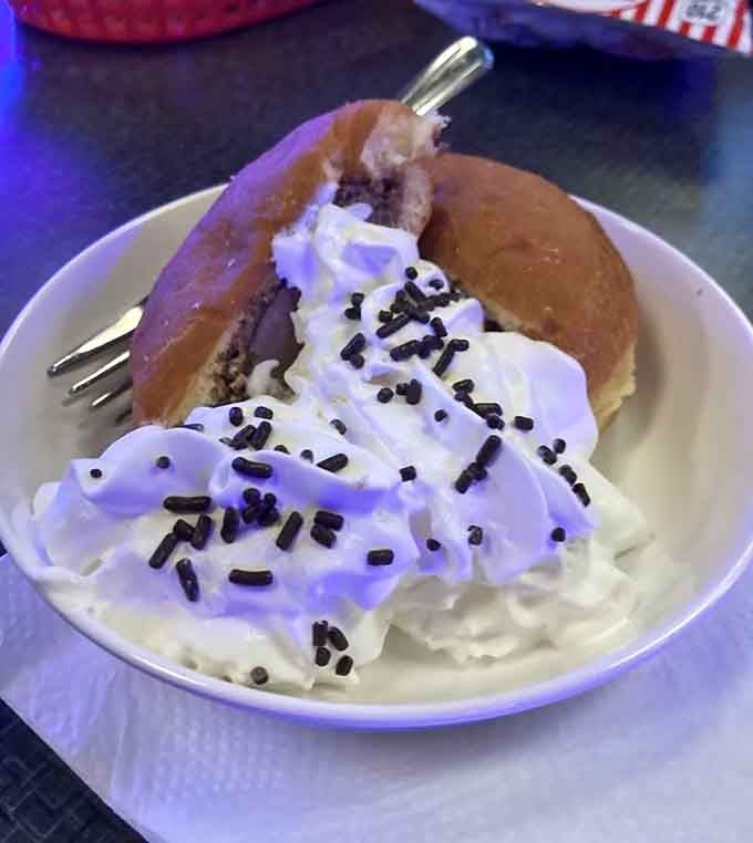 Pie &agrave; la mode topped with whipped cream and sprinkles, because dessert should be as fun as the games.