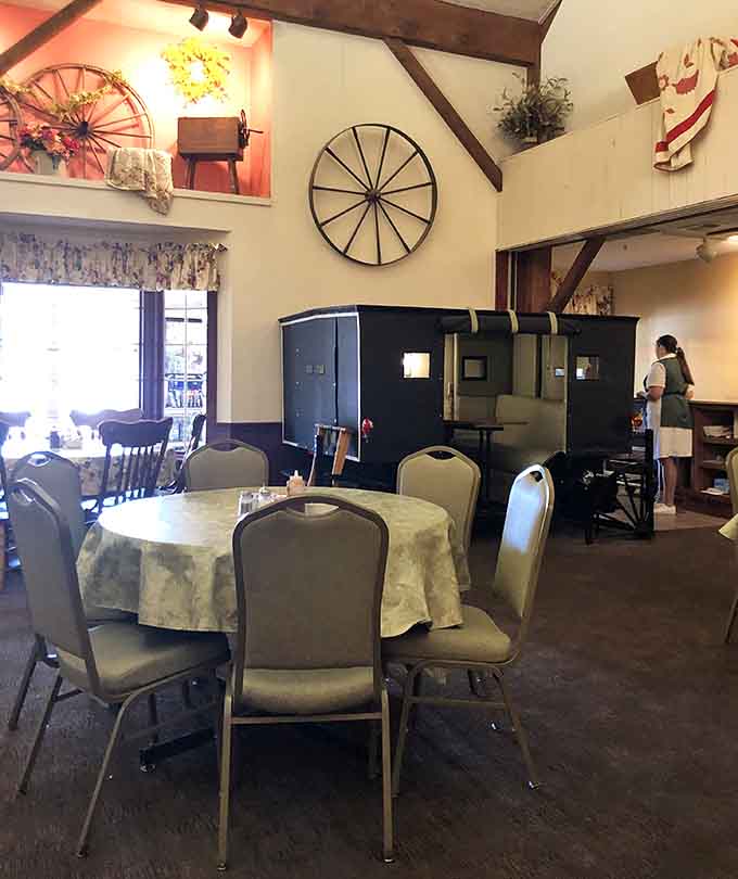 The interior's rustic charm with wagon wheel decor reminds you that authentic country hospitality never goes out of style.