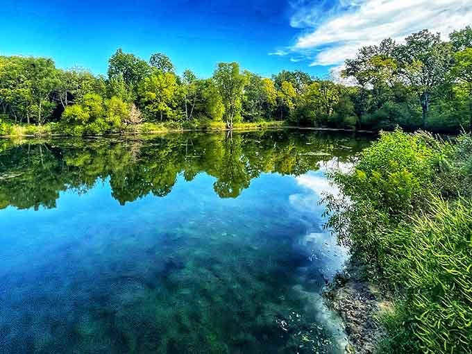Water so clear it mirrors the sky, proving nature's still the best decorator money can't buy.