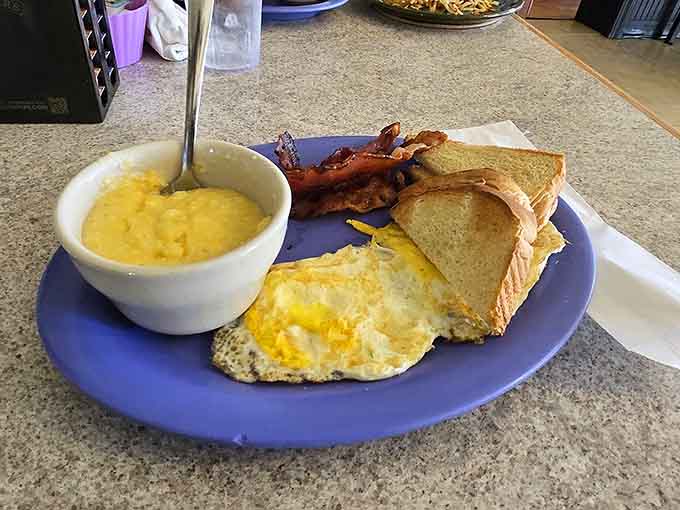 Two eggs, bacon, grits, and toast is the breakfast that built America, one satisfied customer at a time.