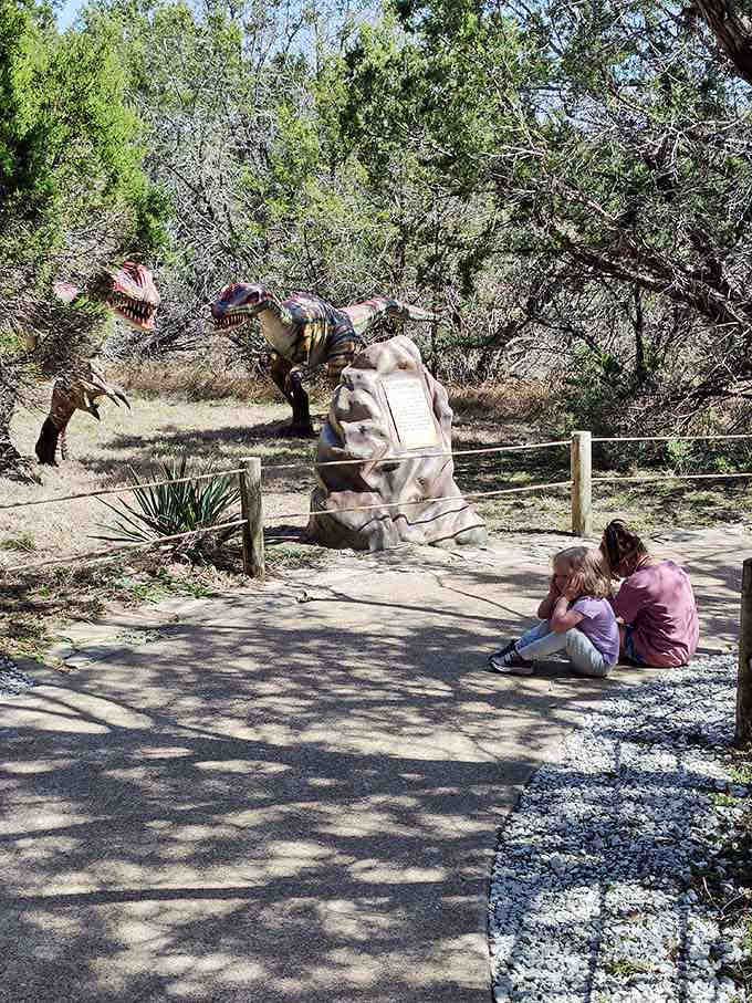 Two sisters contemplate the Liliensternus, probably wondering if their sibling rivalry would've survived the Triassic Period's challenges.