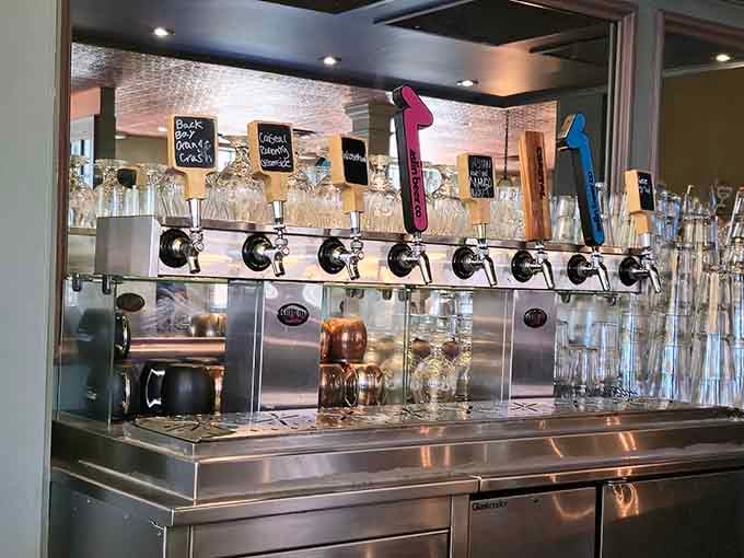 The gleaming tap handles lined up like soldiers ready to dispense liquid happiness, with chalkboard labels adding that personal touch we all appreciate.